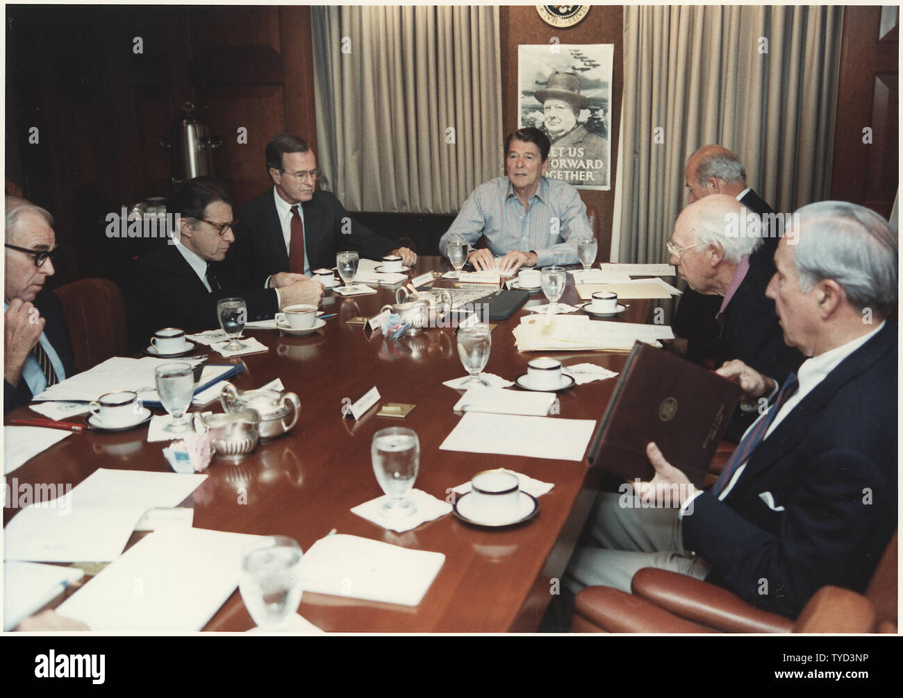 Photograph of President Reagan holding a National Security Council ...