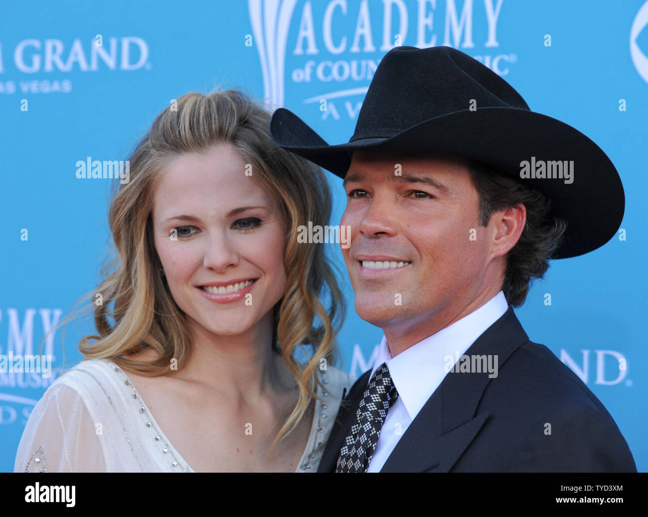 Clay Walker and his wife Jessica arrrive on the Orange Carpet at the ...
