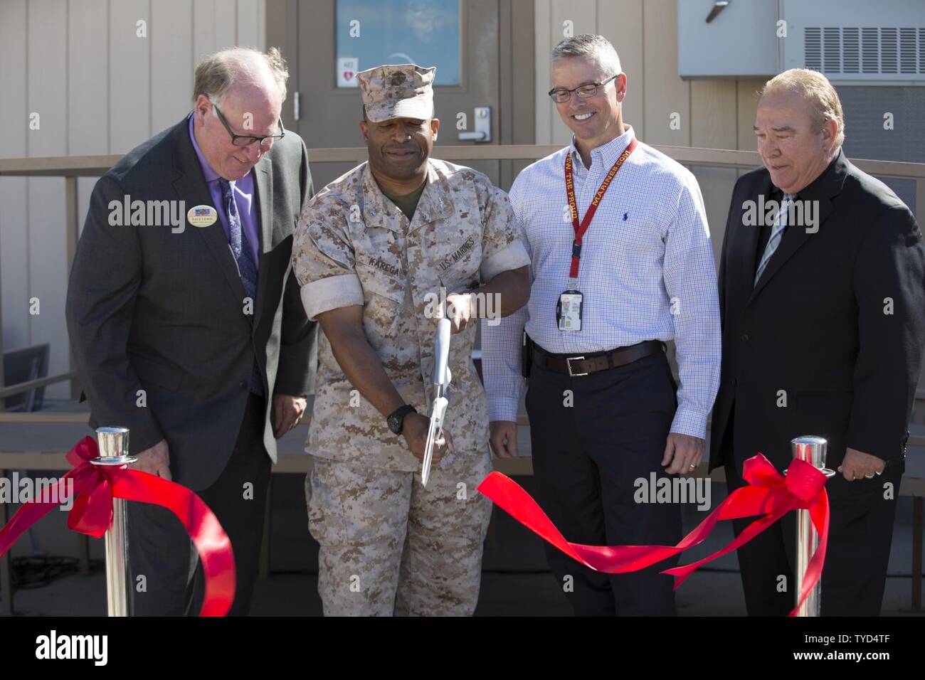 (Left) David Lewis, MCCS Camp Pendleton, Col. Sekou Karega, commanding ...