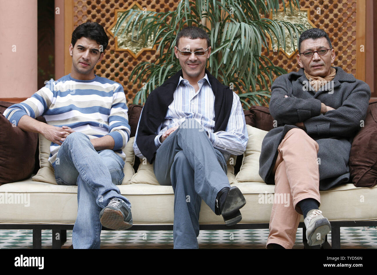 Actors Omar Lotfi (L), Amine Ennaji (C) and director Mohamed Zineddaine ...