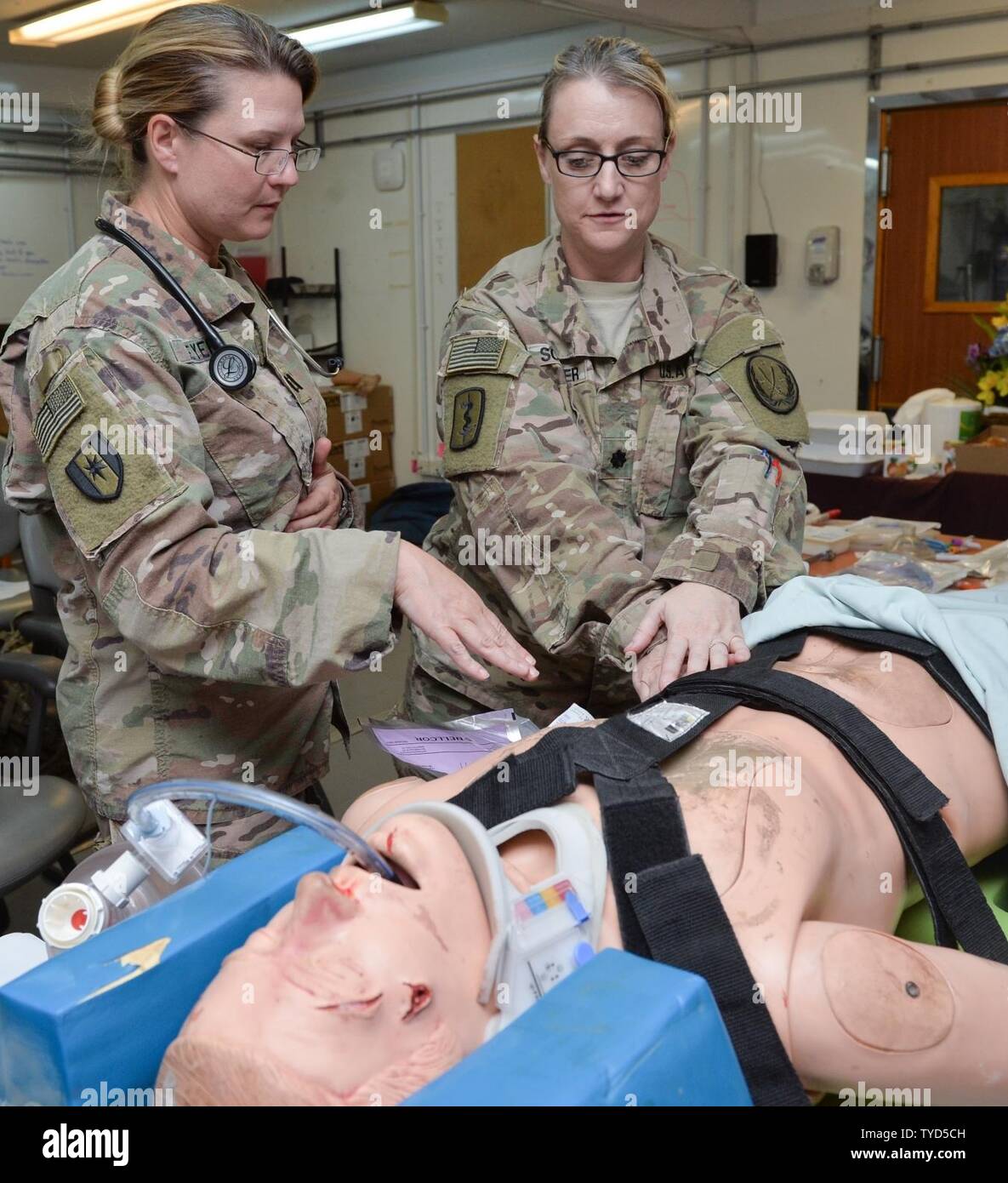 U.S. Army Capt. Leslie Meyers, left, 28th Combat Support Hospital ...