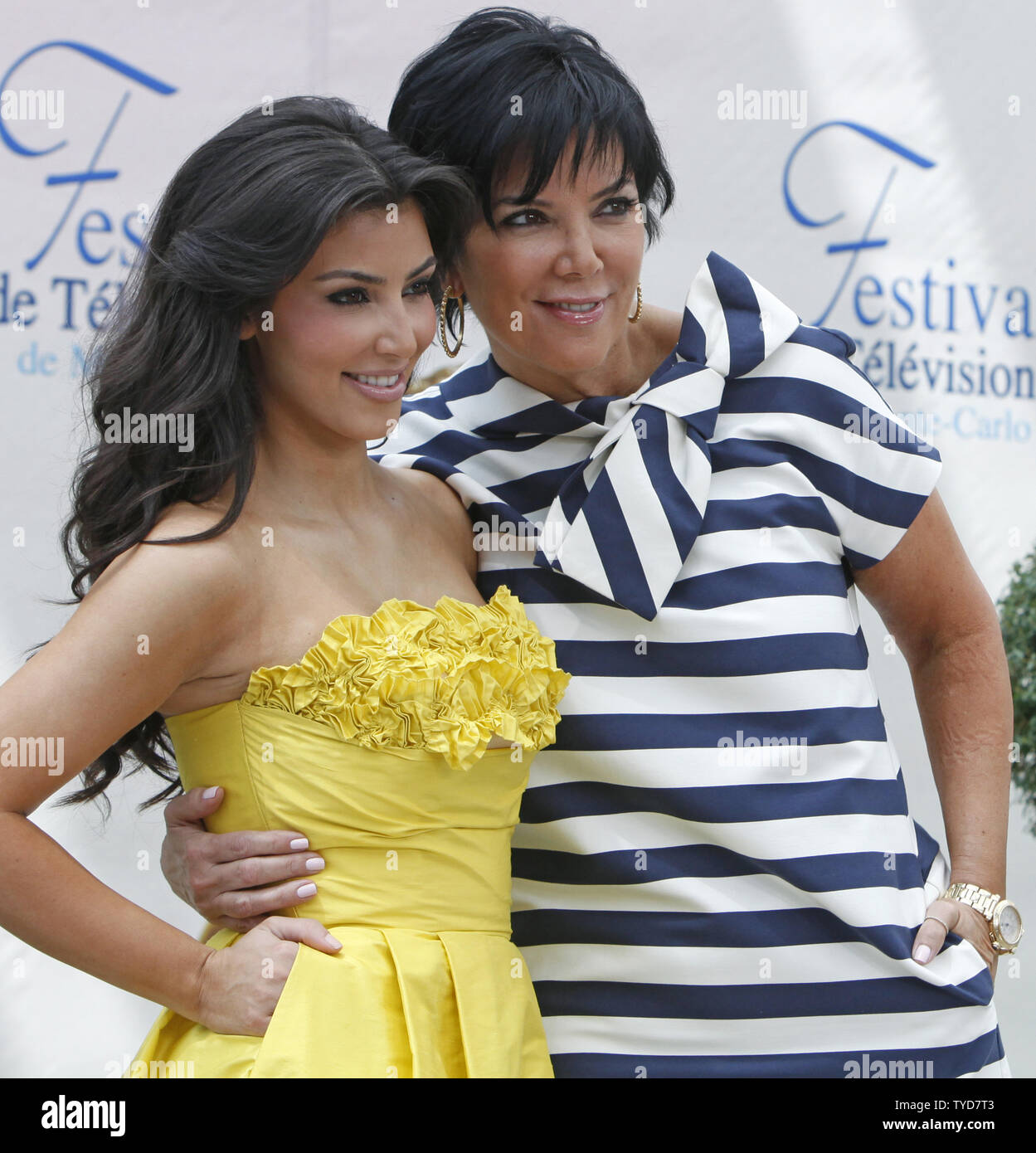 TV personality Kim Kardashian (L) and her mother Kris arrive at a ...