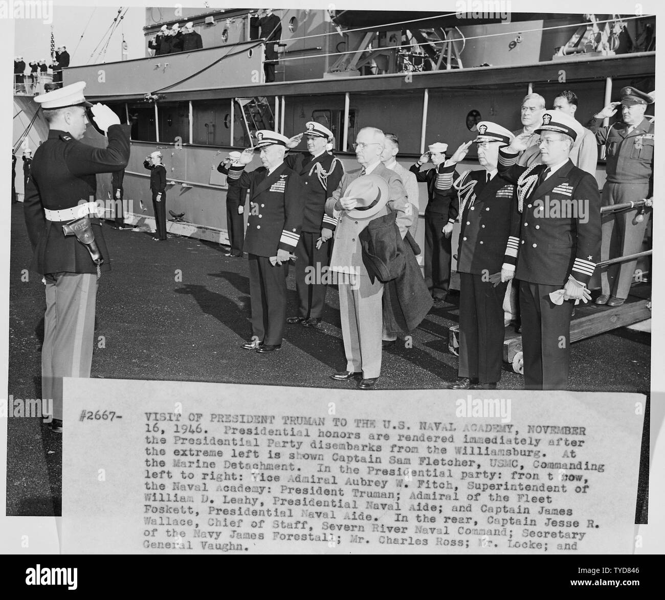 Photograph of President Truman and his party receiving honors as they ...