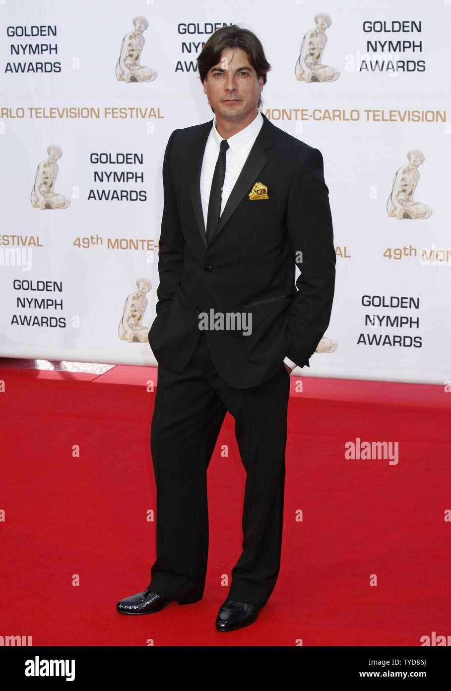 Actor Bryan Dattilo arrives on the red carpet before the closing ...