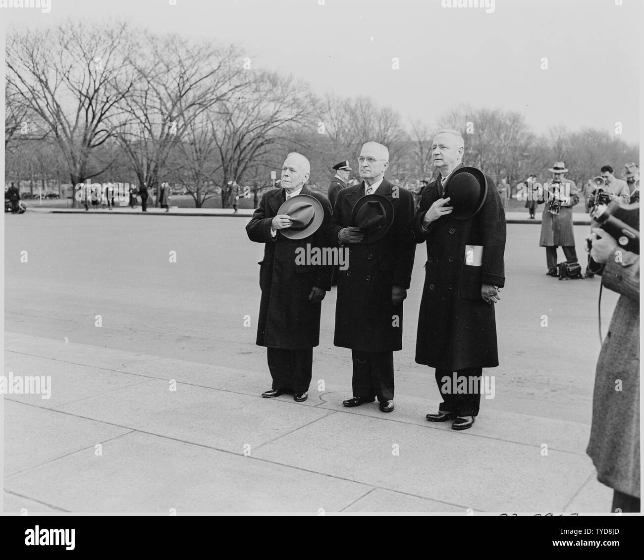 Photograph of President Truman and other dignitaries standing at ...