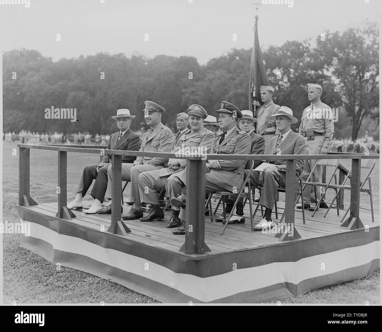 Photograph of president truman other dignitaries on the reviewing stand ...