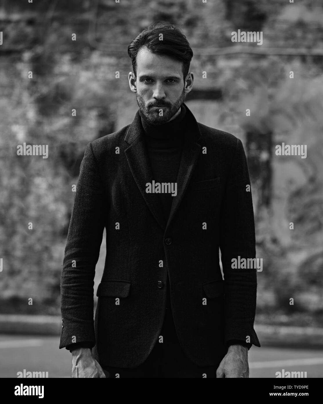 Successful young man standing in Black and White Stock Photos & Images ...