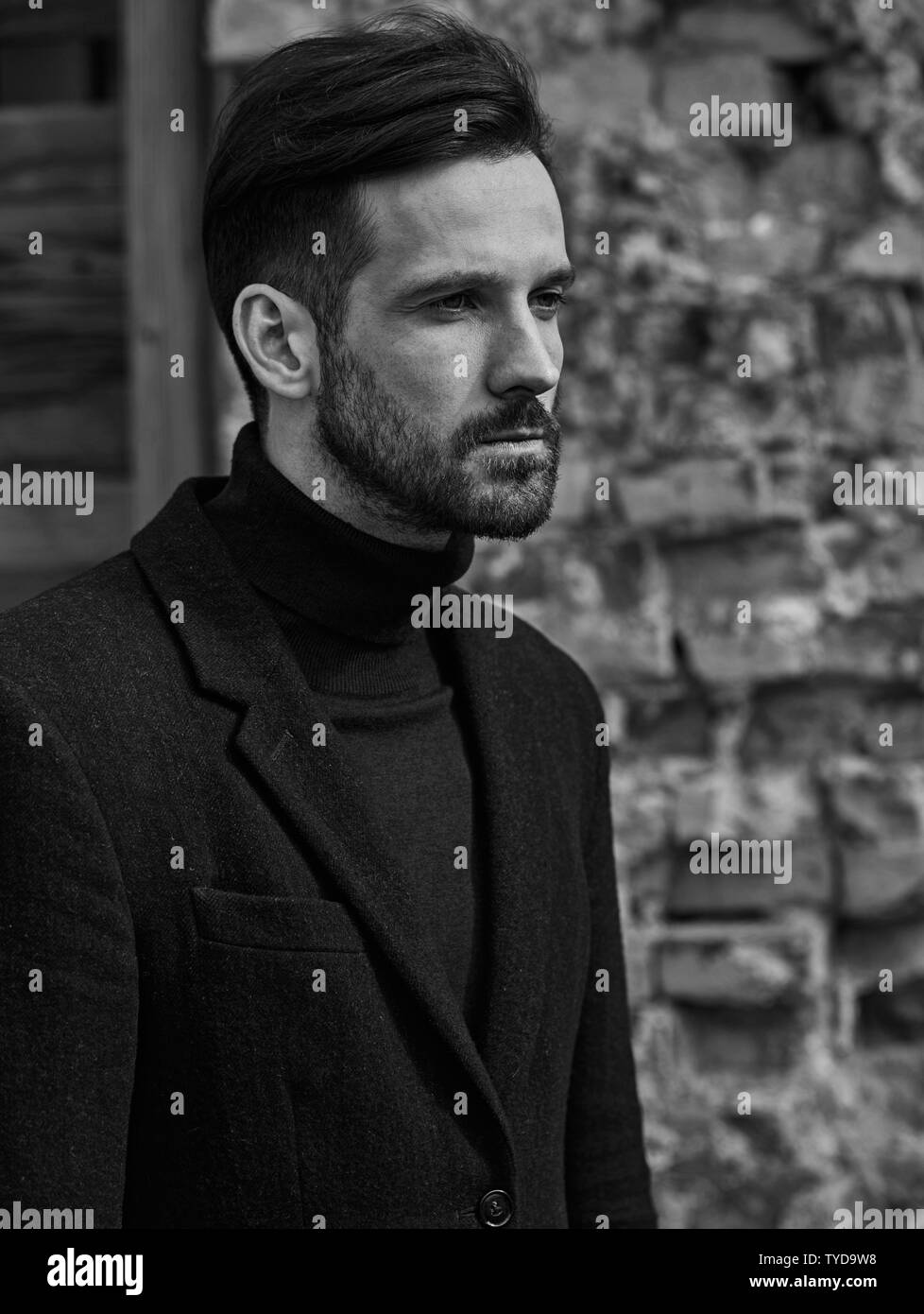 Fashion beard sad handsome male model in trouble posing in style ...