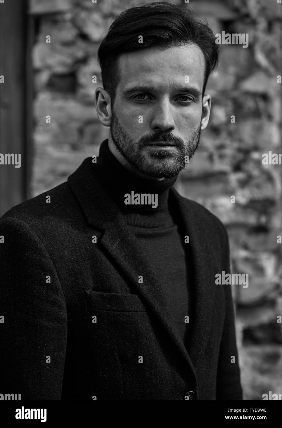 Fashion beard sad handsome male model in trouble posing in style ...