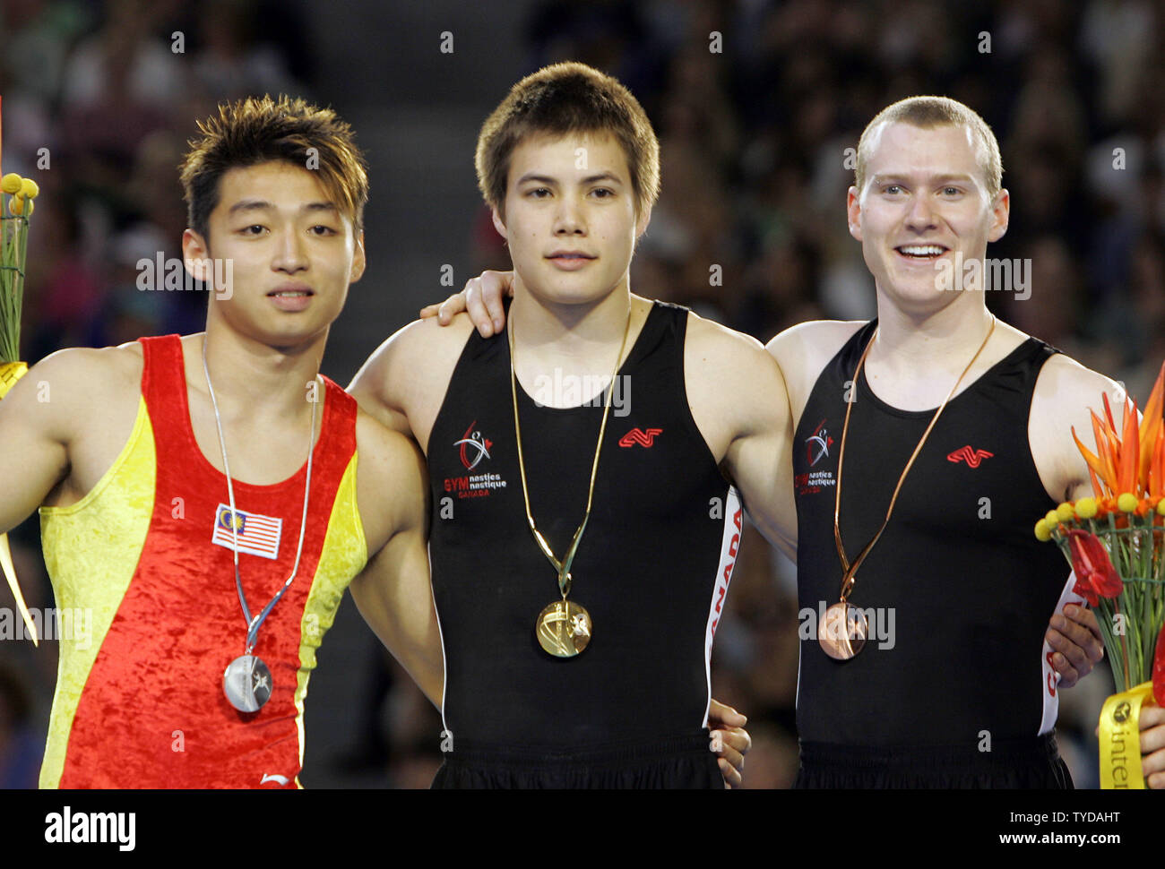 Medalists gather following the men's gymnastics floor exercise finals ...