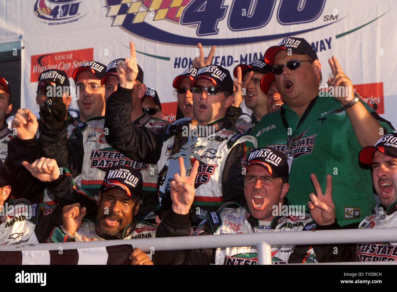Bobby Labonte celebrates winning the NASCAR Ford 400 with teammates, at ...
