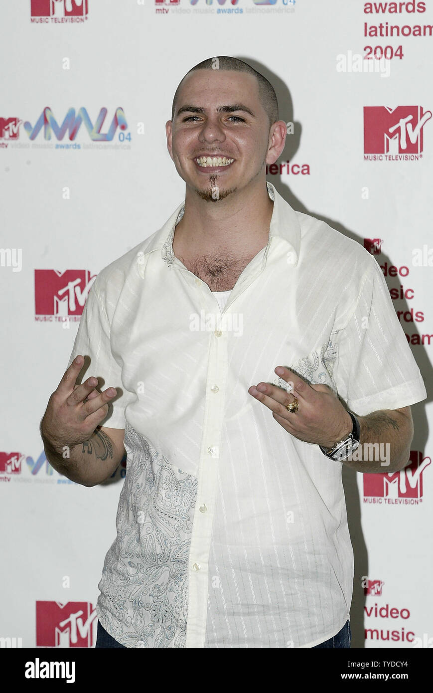 Pitbull poses for the media at the 2004 MTV Video Music Awards ...