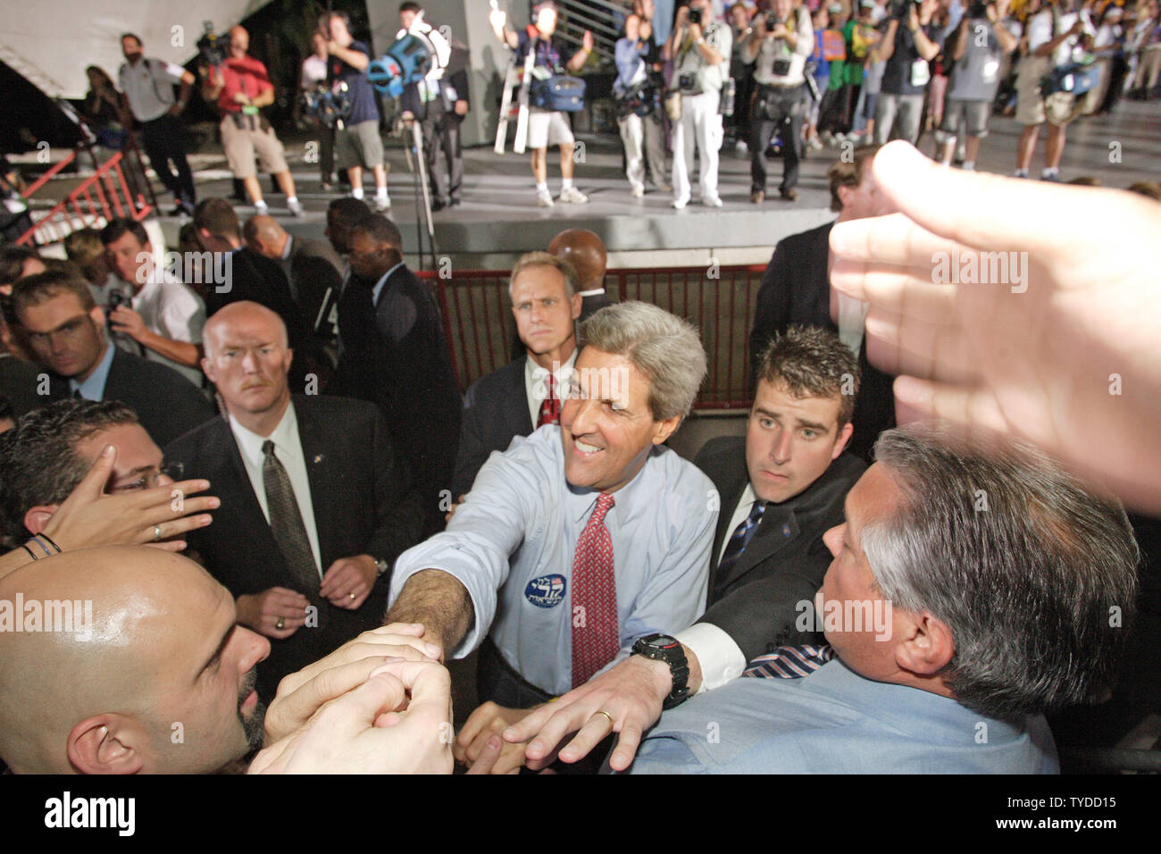 John Kerry shakes hands at a star filled rally in Miami at Bayfront ...