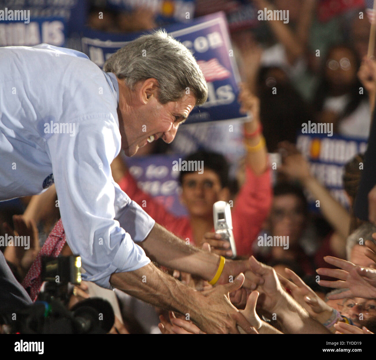 John Kerry shakes hands at a star filled rally in Miami at Bayfront ...