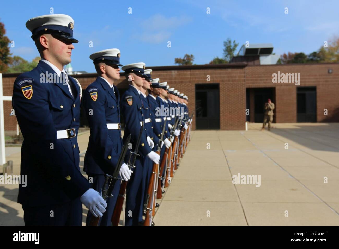 Members of the U.S. Coast Guard Ceremonial Honor Guard line up to be ...
