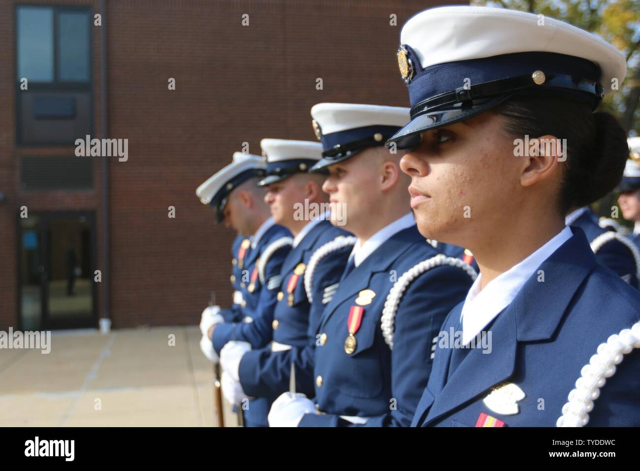 Members of the U.S. Coast Guard Ceremonial Honor Guard line up to be ...