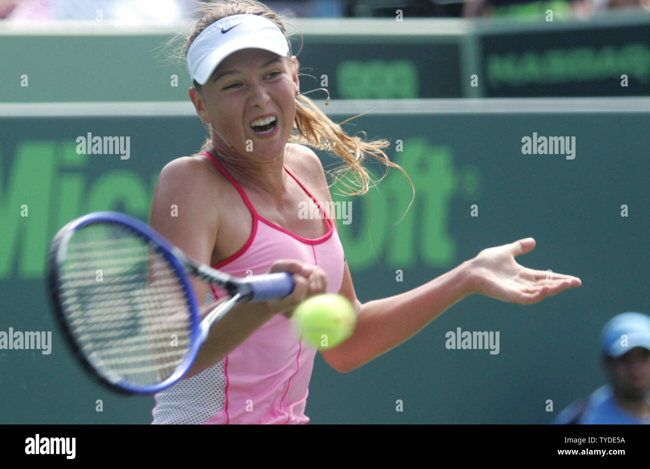 Maria Sharapova, of Russia, returns to Venus Williams at the Nasdaq 100 ...