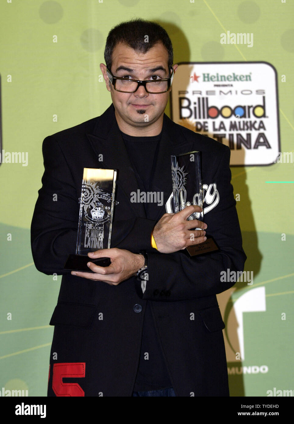 Aleks Syntek displays his awards backstage at the 2005 Latin Billboard ...