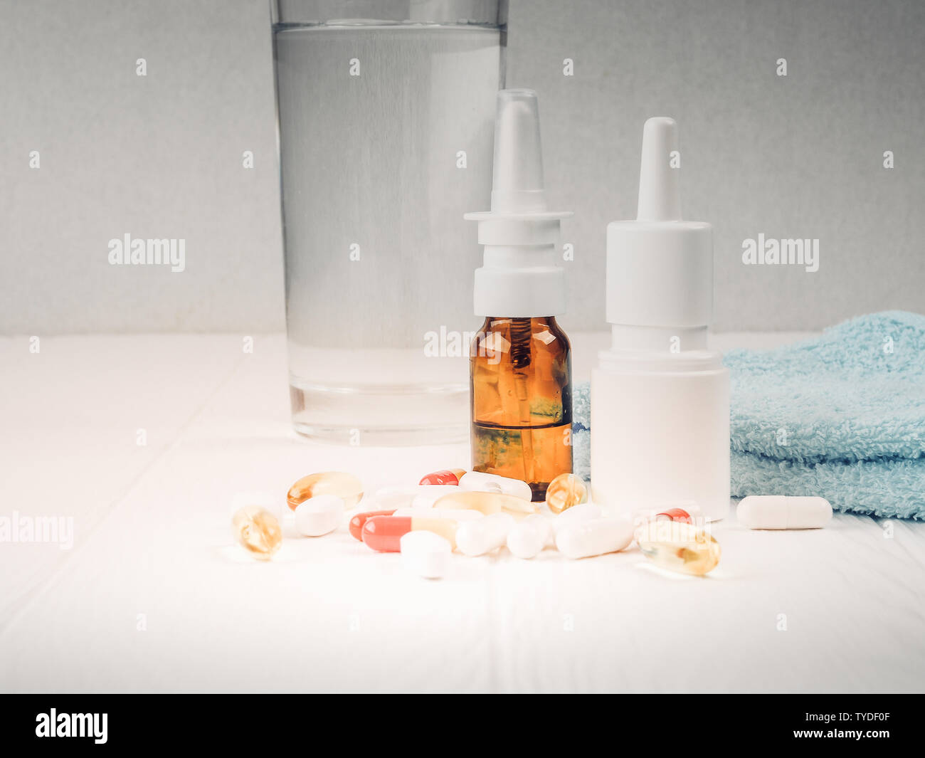 Medicine, drugs. Stack of colorful pills packages and bottles on white ...