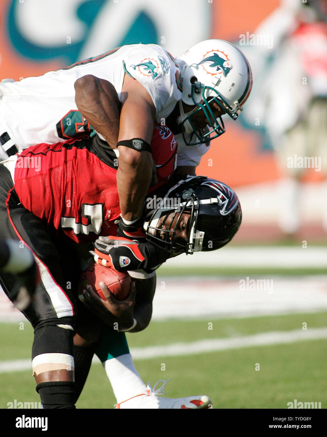 Miami Dolphins Jason Taylor sacks Atlanta Falcons qujarterback Michael ...