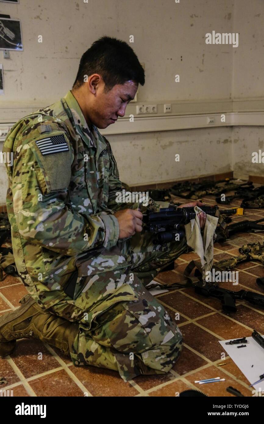 U.S. Army Pfc. Daro Yim of 1st Squadron, 33rd Cavalry Regiment, 3rd ...