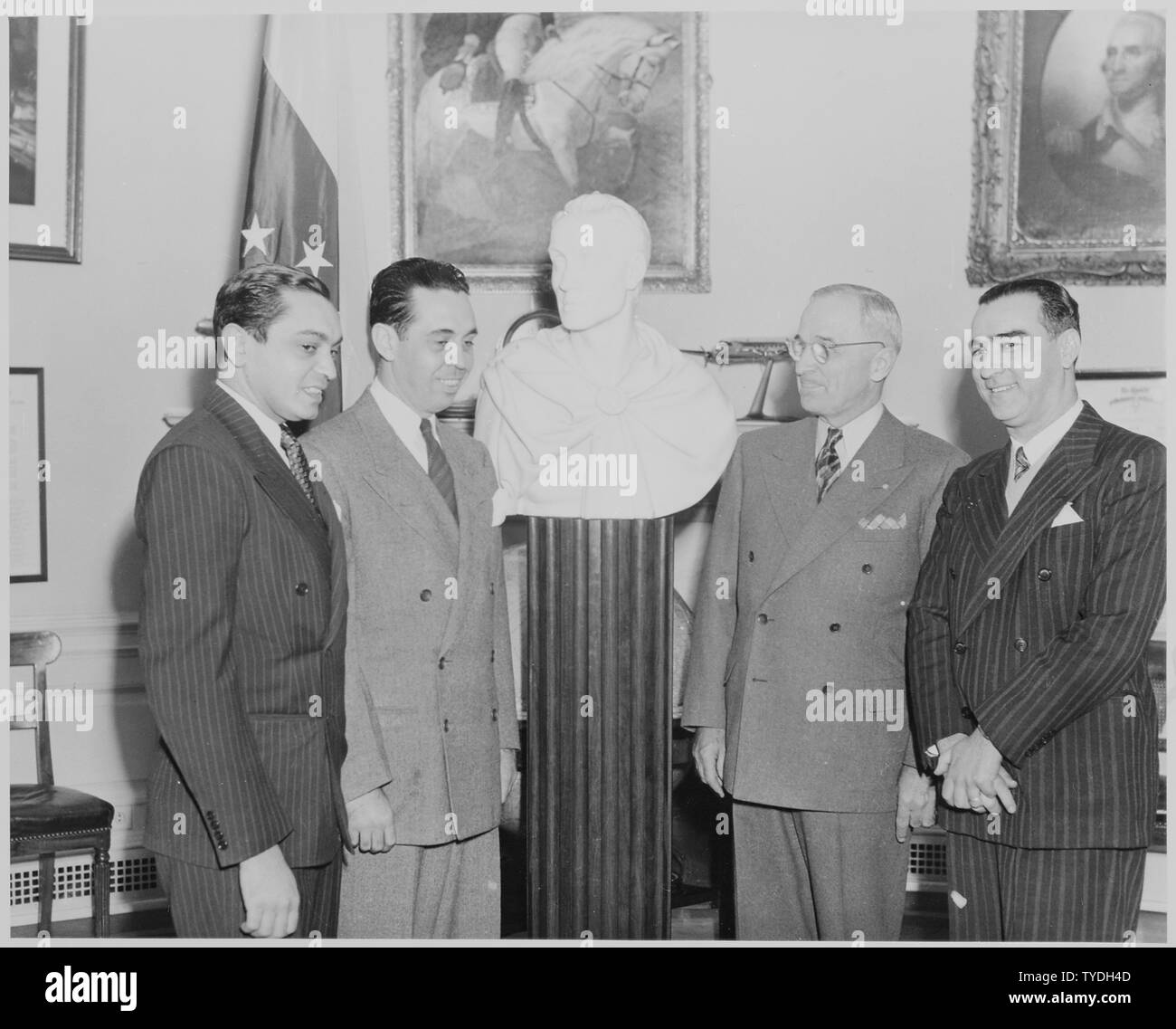 Photograph of President Truman receiving a marble bust of Simon Bolivar ...