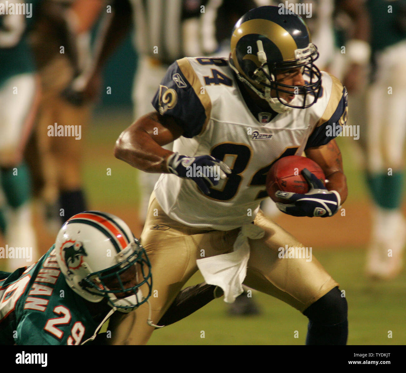 St. Louis Rams wide receiver Shaun McDonald (84) gains yardage against ...