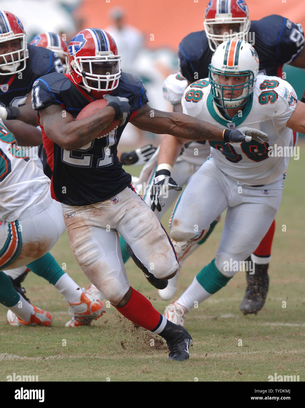 Buffalo Bills running back Willis McGahee is chased by Miami Dolphins ...