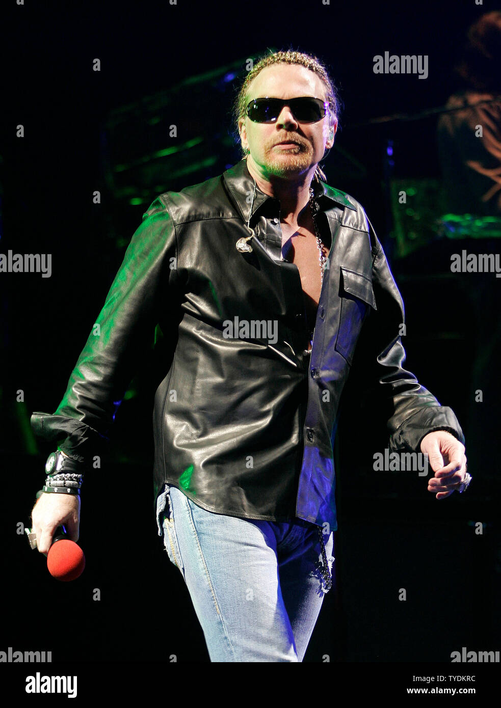 Axl Rose with Guns N Roses performs on the opening night of their tour ...