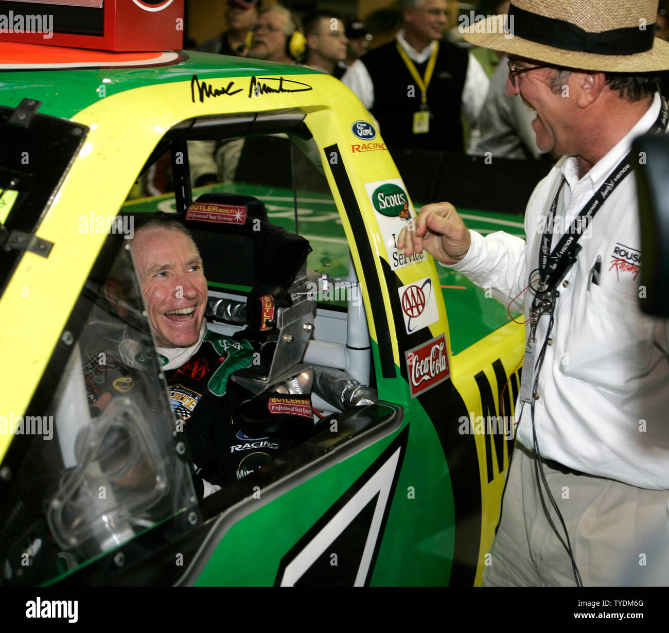 Mark Martin celebrates with his owner Jack Roush after winning the ...