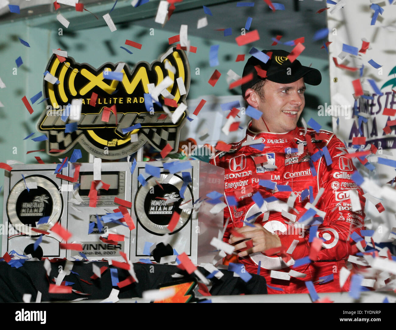 Dan Wheldon of England celebrates winning the XM Satellite Radio Indy ...