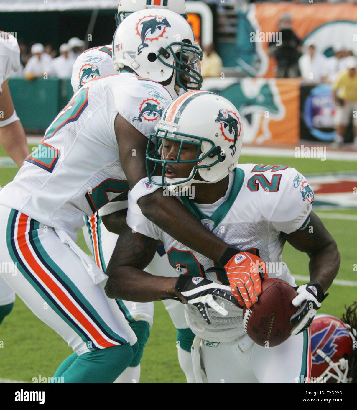 Miami Dolphins cornerback Will Allen (25) tries to gain yardage after ...