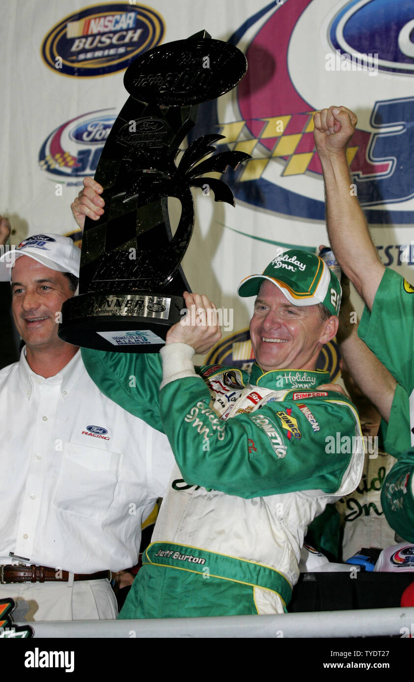 Jeff Burton celebrates winning the NASCAR Busch series Ford 300 at ...