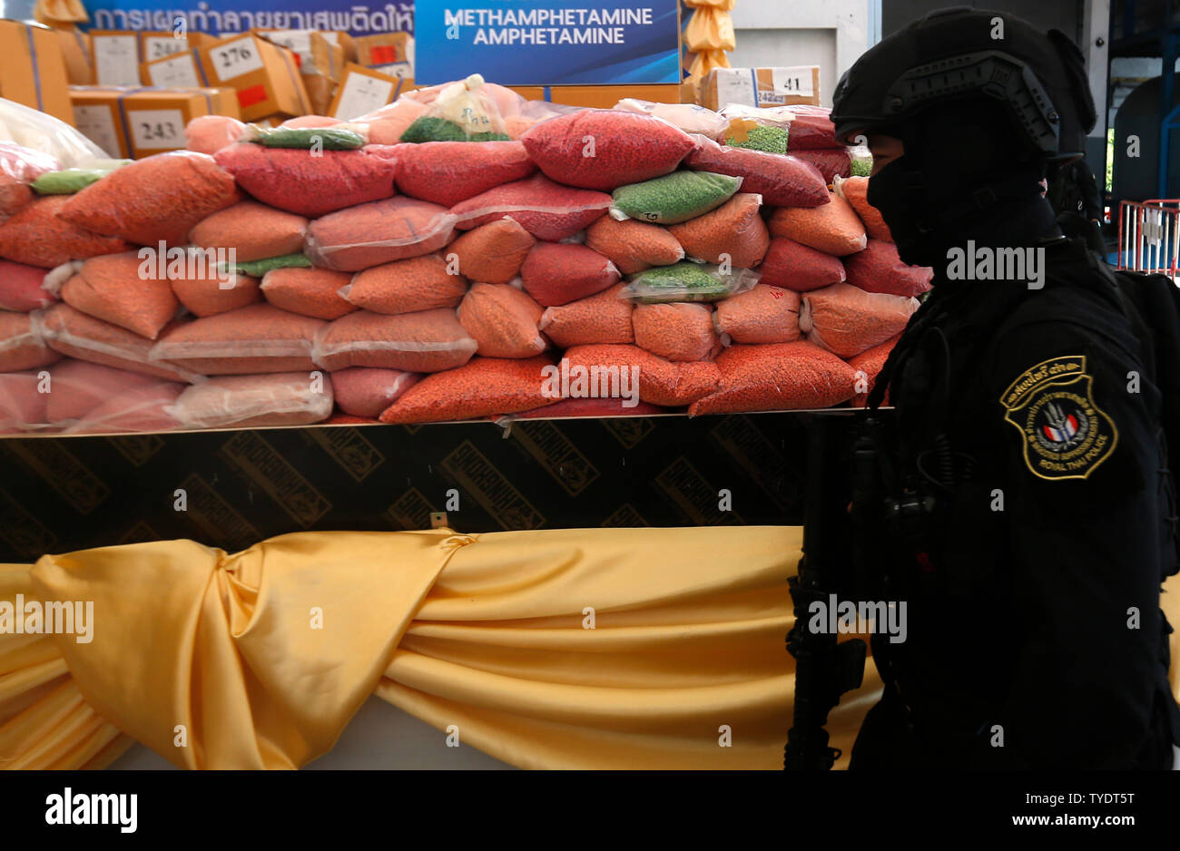 A police officer from the Narcotics Control Board stands on guard in ...