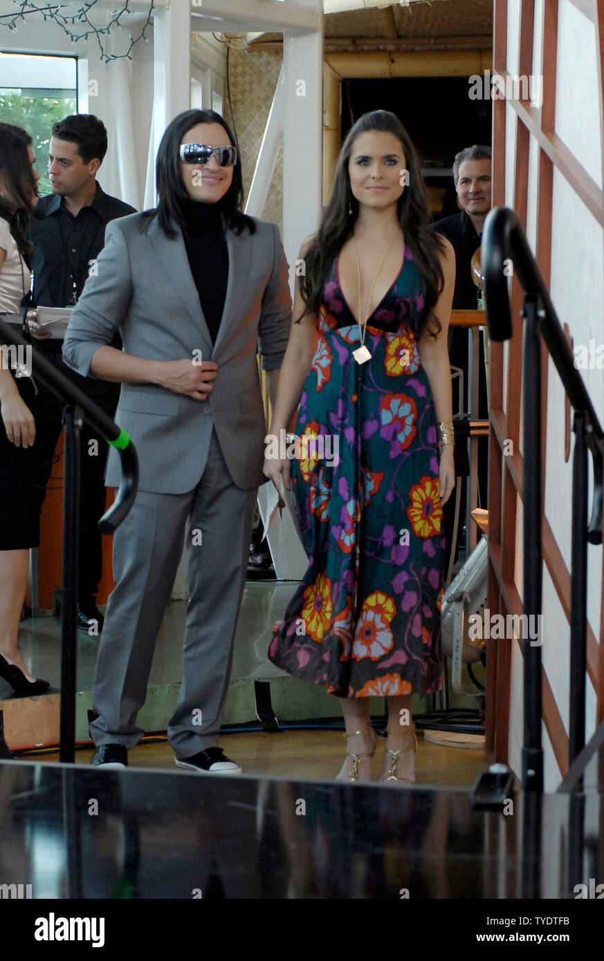 Presenters Elvis Crespo and Lilia Luciano wait backstage to announce ...