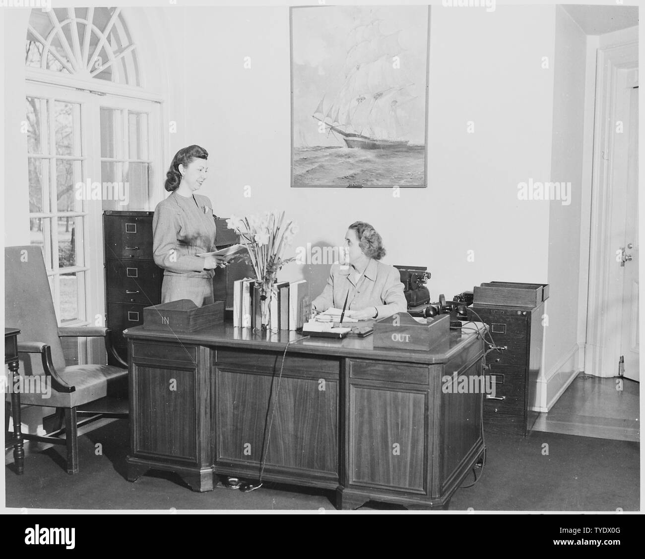 Photograph of President Truman's secretary, Rose Conway, at her desk in ...