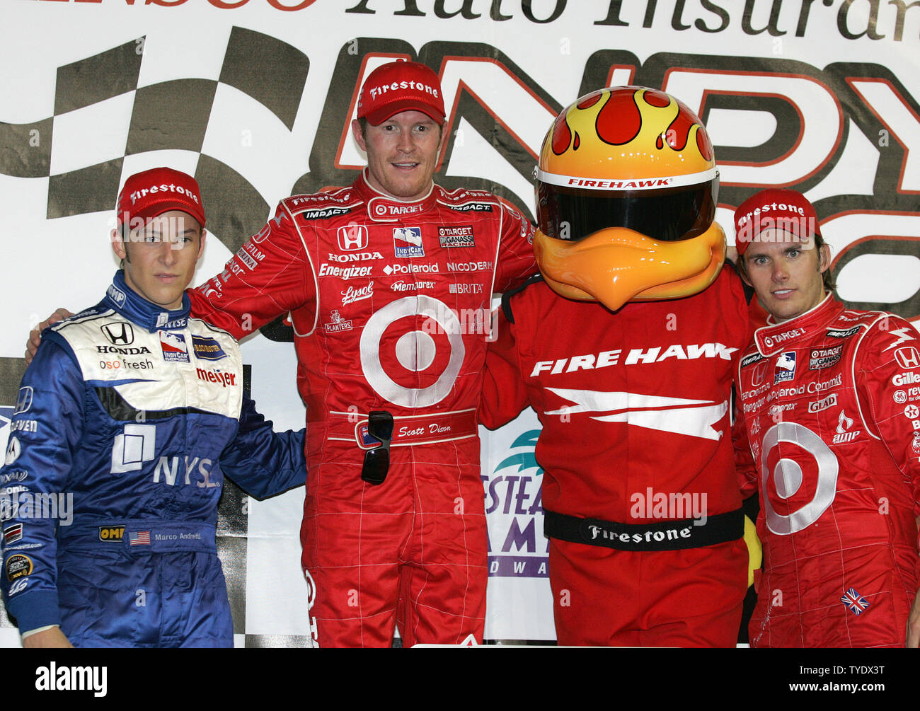 Scott Dixon celebrates winning the IRL Gainsco Indy 300 with teammate ...