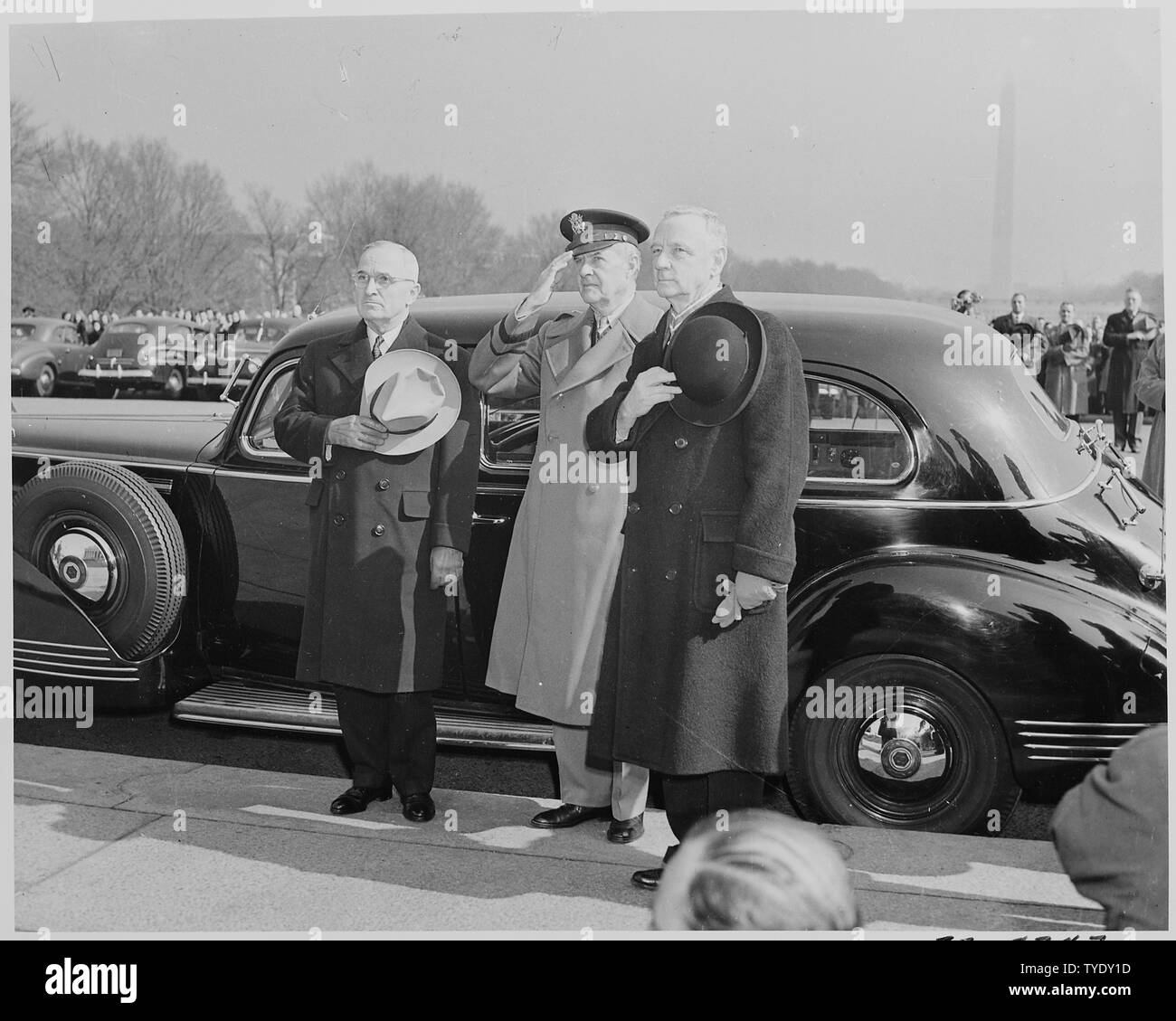 Photograph of President Truman, with two unidentified men, standing ...