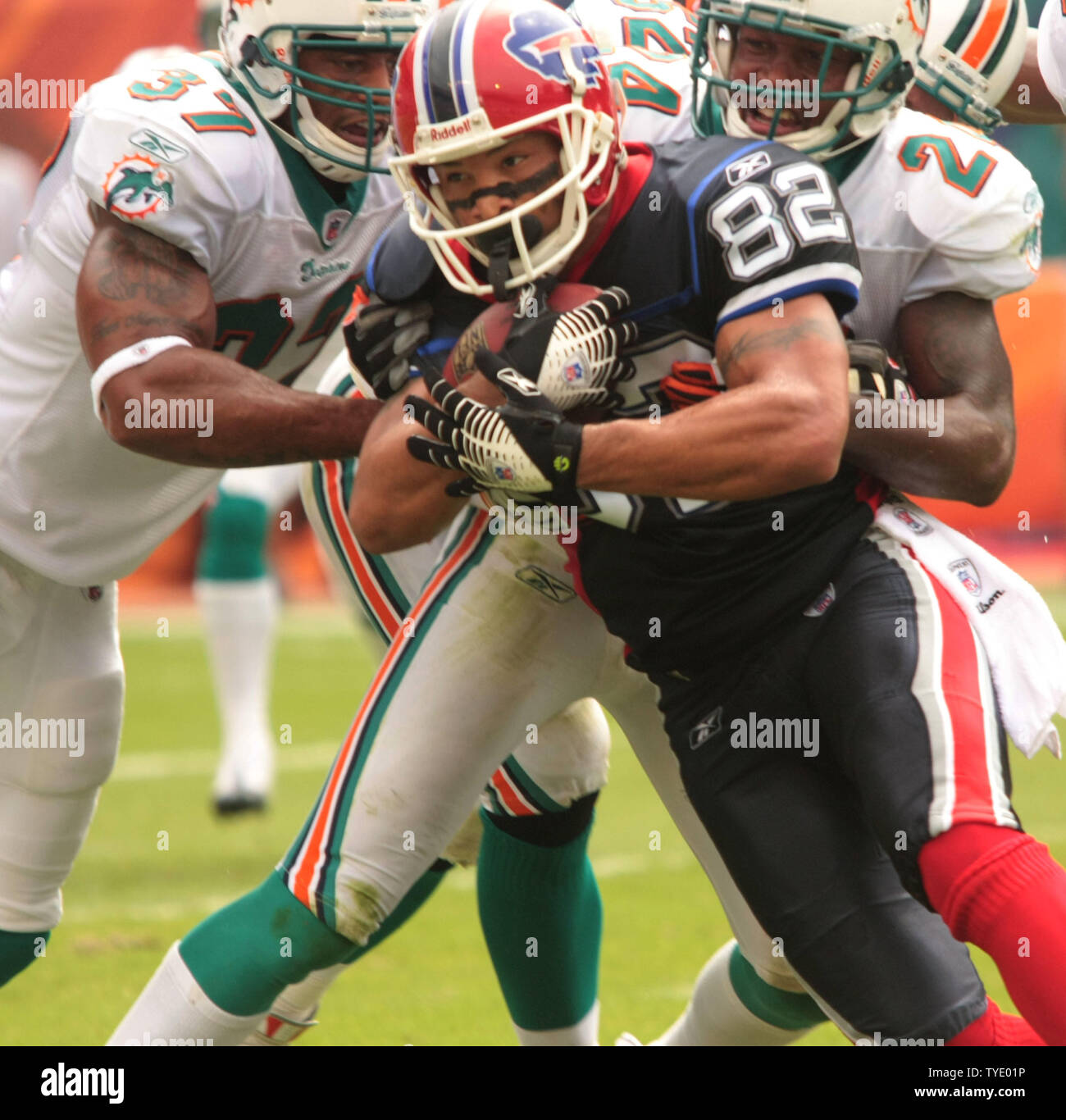 Buffalo Bills wide receiver Josh Reed (82) fights for yardage against ...
