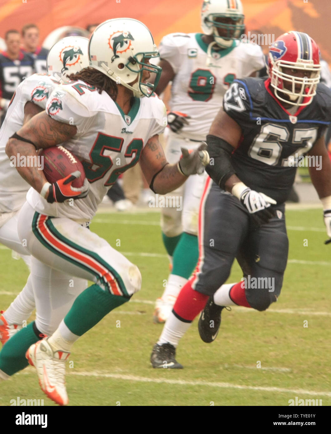 Miami Dolphins linebacker Channing Crowder (52) returns a Buffalo Bills ...