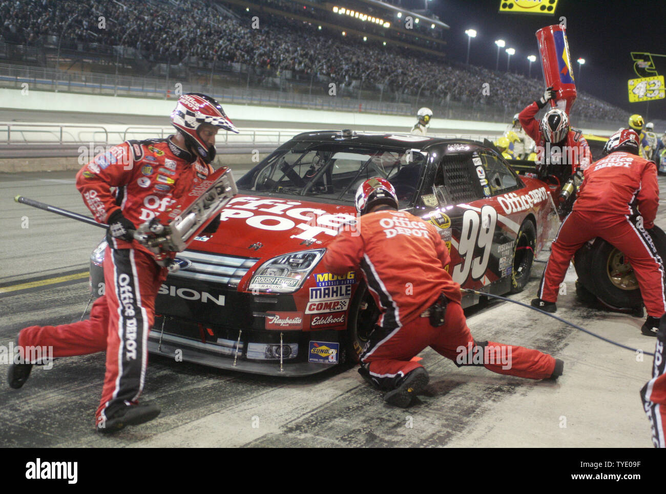 Carl Edwards brings his car in the pits during late race action in the ...