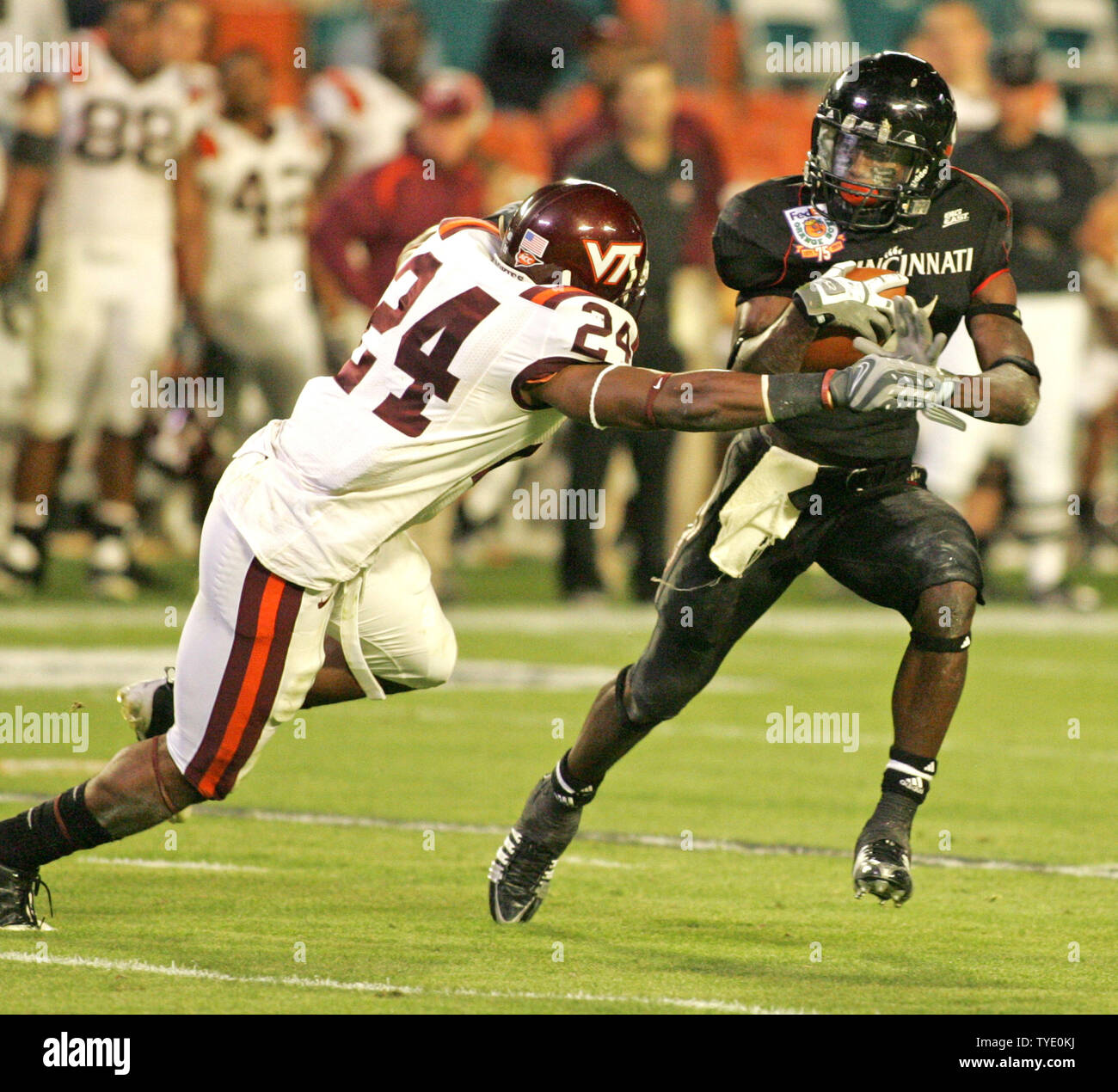 Cincinnati Bearcats receiver Mardy Gilyard (1) gains 14 yards on this ...