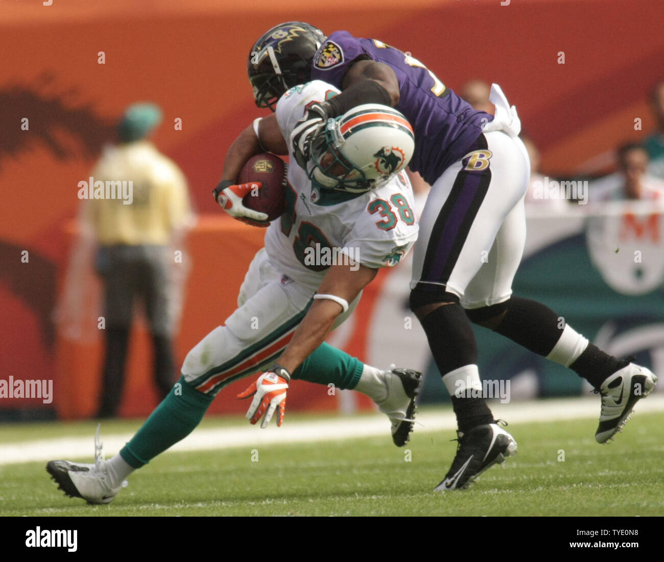 Baltimore Ravens cornerback Corey Ivy tackles Miami Dolphins running ...