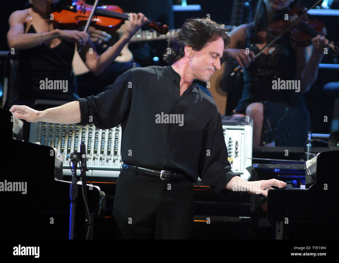 Yanni performs in concert on the opening night of "Yanni Voices" the ...