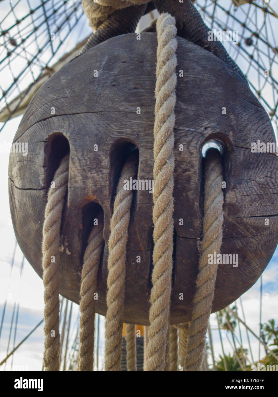 Large old wooden deadeye traditional sailing ship Stock Photo - Alamy