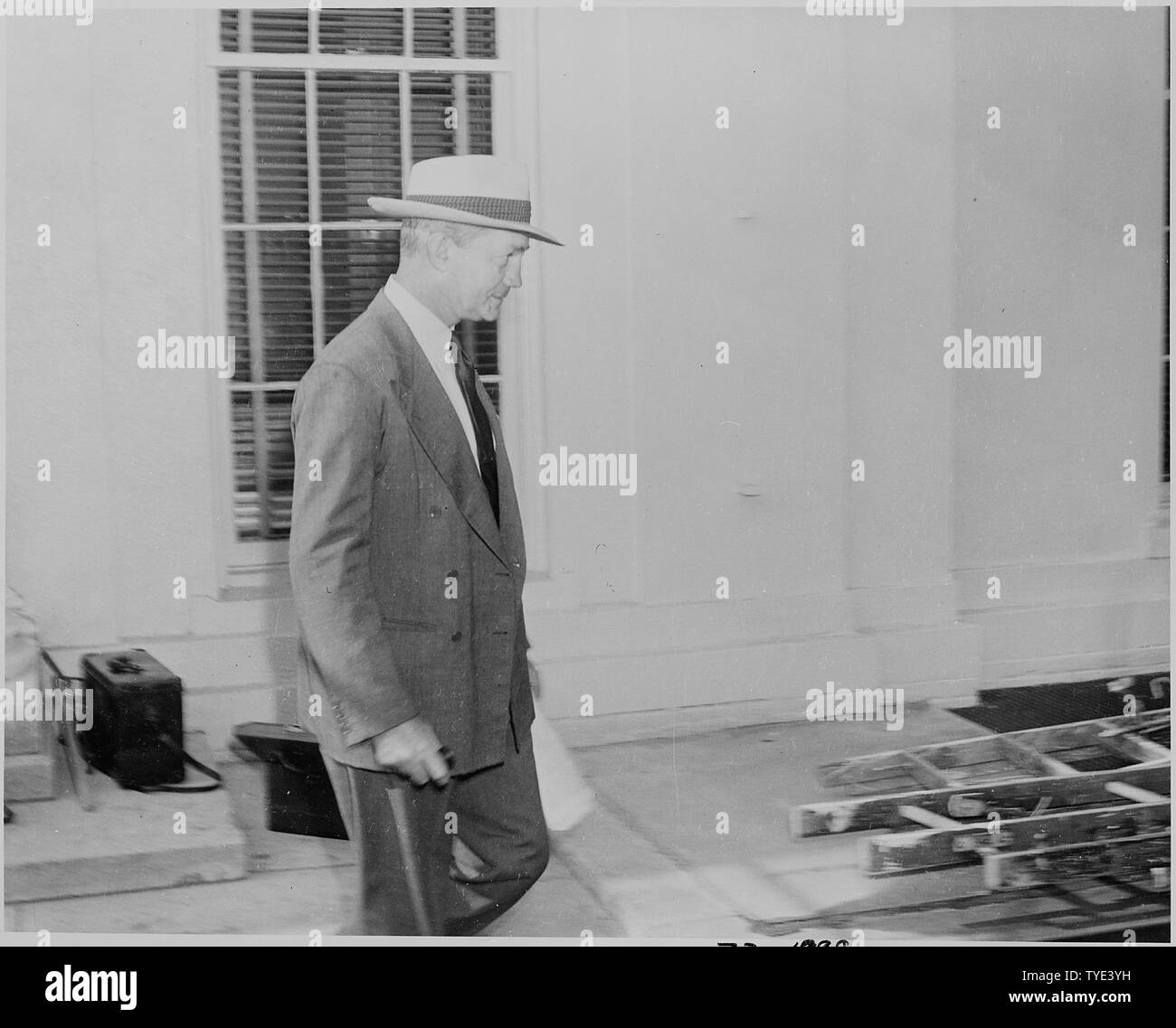 Photograph of Secretary of the Navy James Forrestal, evidently leaving ...