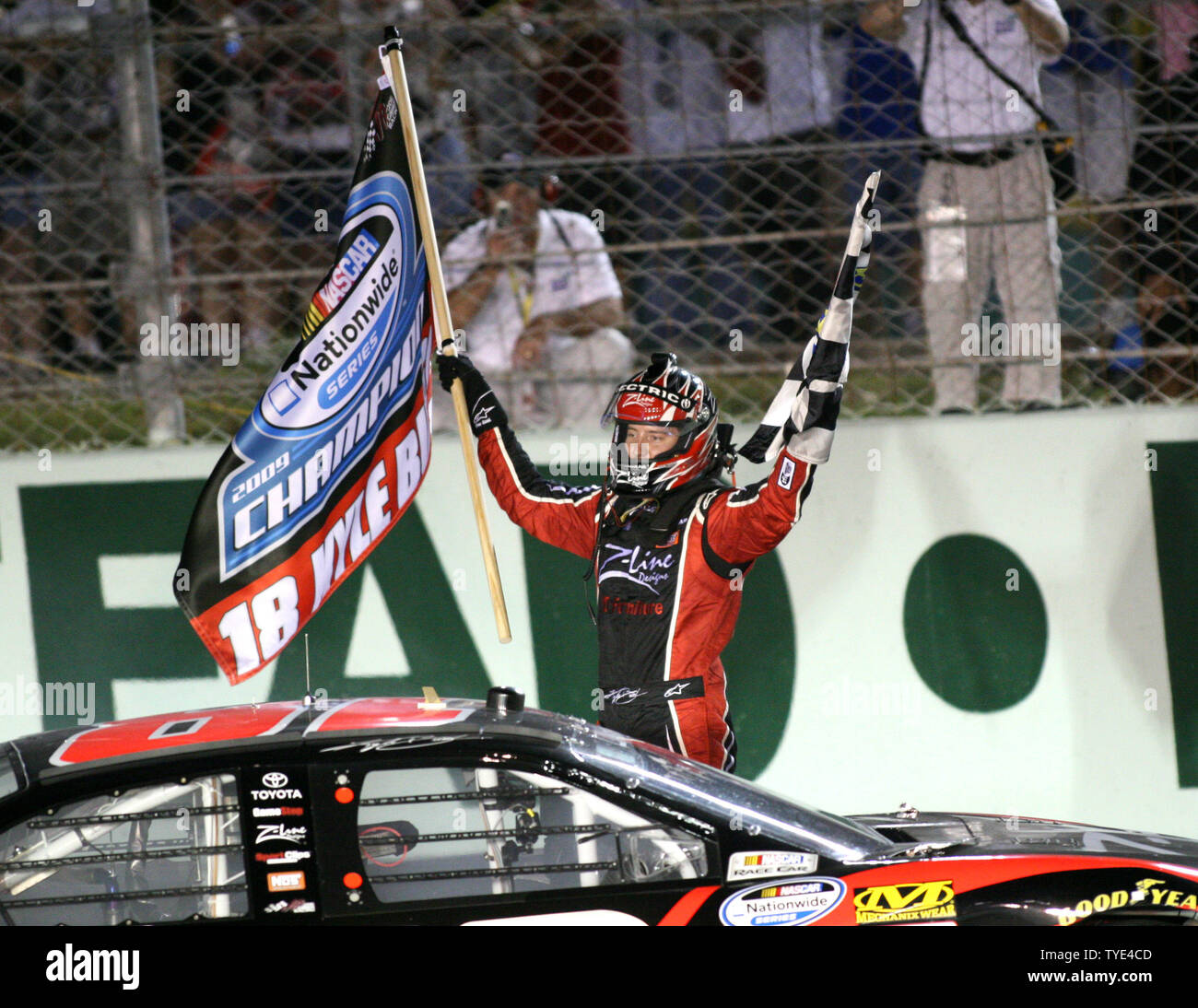 Kyle Busch celebrates winning the NASCAR Nationwide Ford 300 and the ...