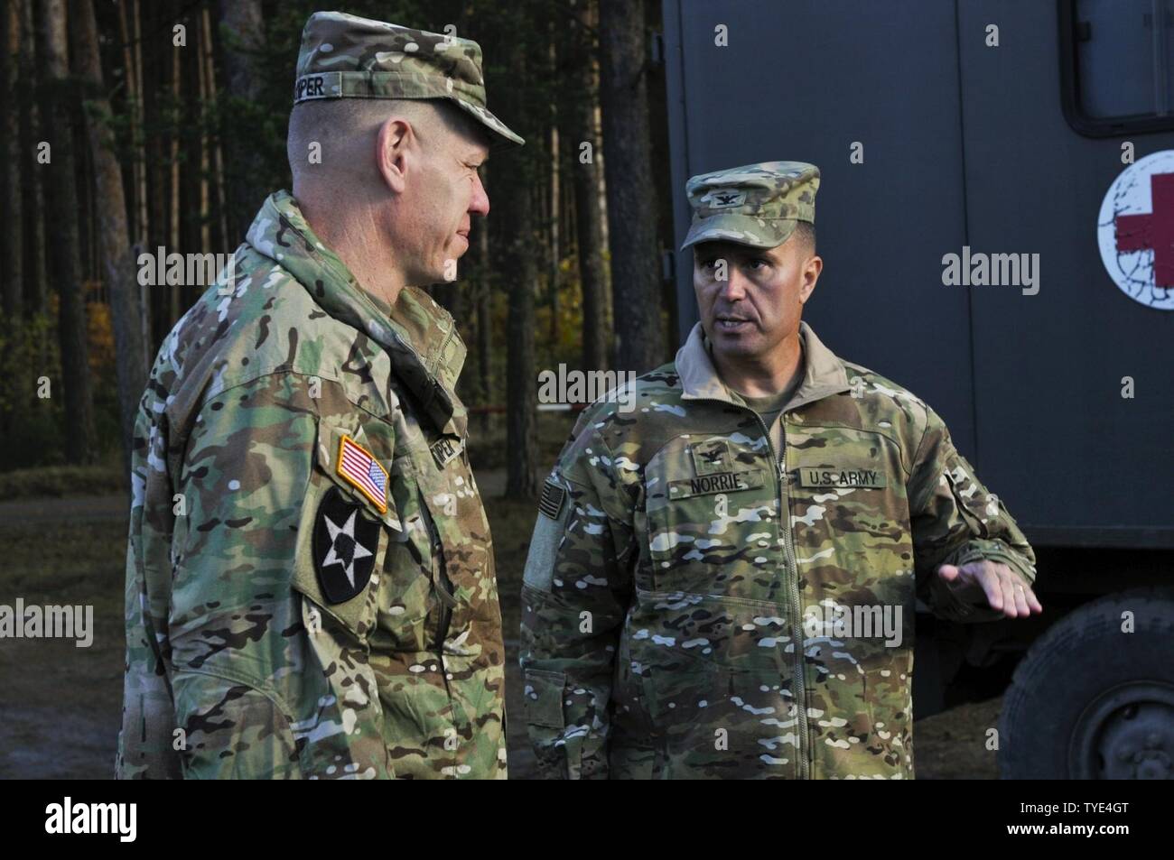 U.S. Army Brig. Gen. Kenneth L. Kamper (left), deputy commanding ...