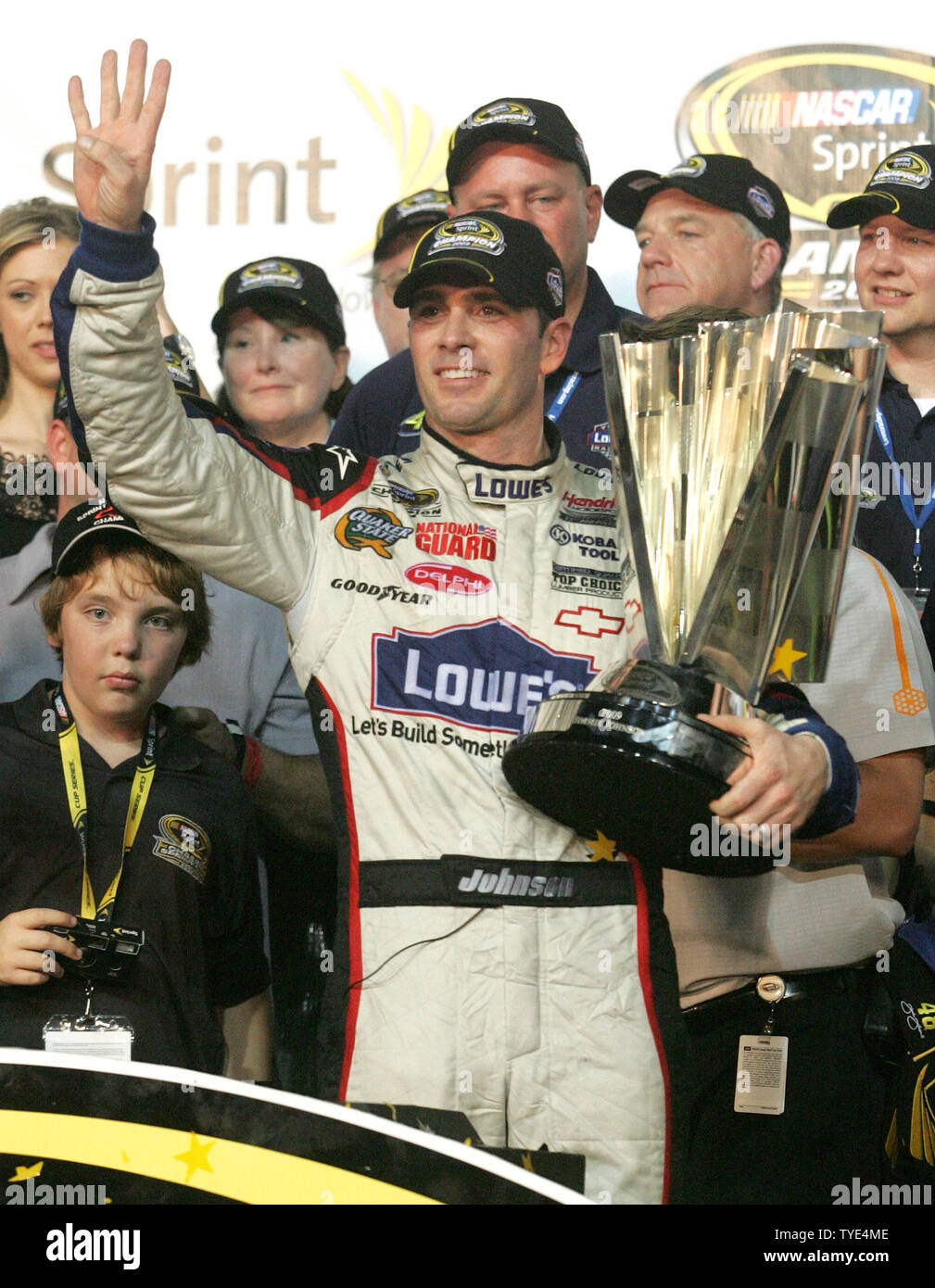 Jimmie Johnson celebrates winning his fourth consecutive NASCAR Sprint ...