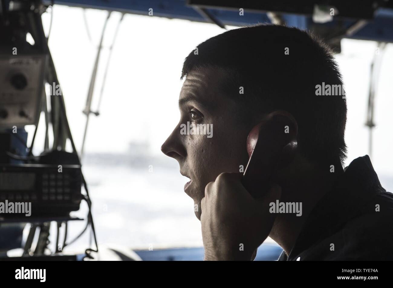PHILIPPINE SEA (Nov. 3, 2016) Lt. j.g. Christopher Huss relays a ...